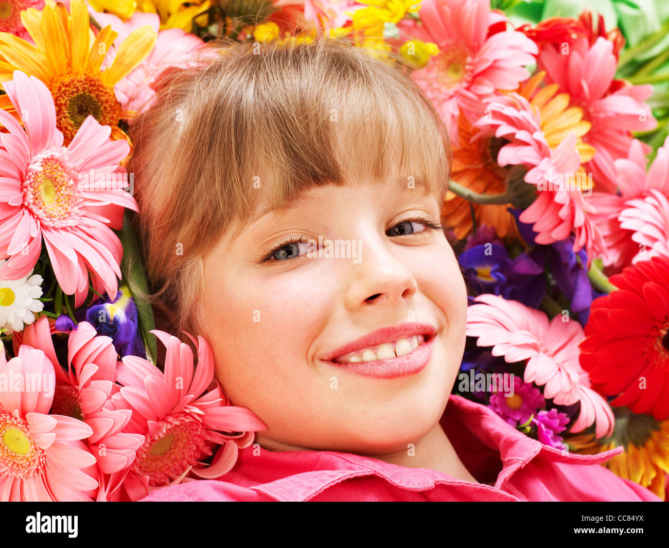 Child lying on the flower Stock Photo - Alamy