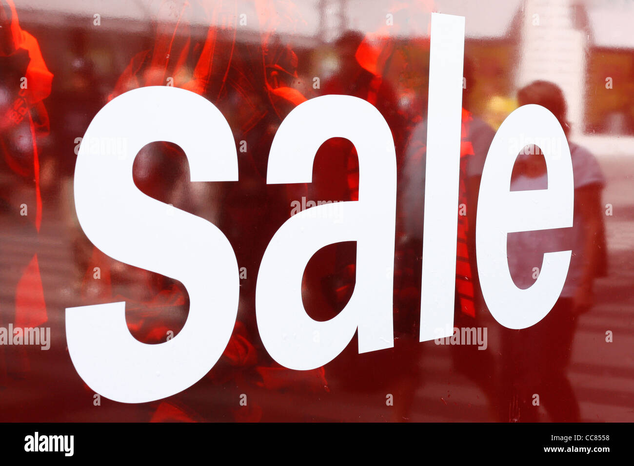 Sale sign on window Stock Photo - Alamy