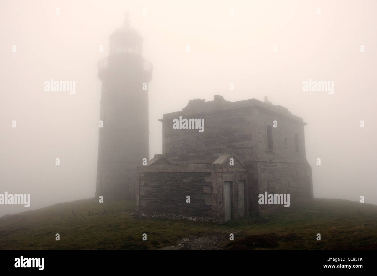Calf of Man Upper Lighthouse in the fog, The Isle of Man Stock Photo ...