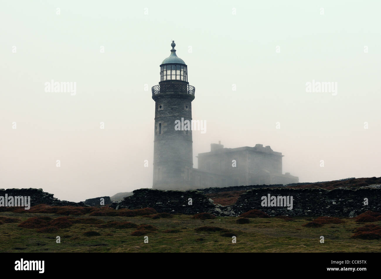 Calf of Man Upper Lighthouse in the fog, The Isle of Man Stock Photo ...