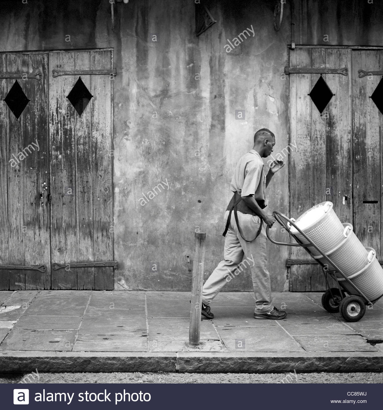 Man With Buckets High Resolution Stock Photography and Images - Alamy
