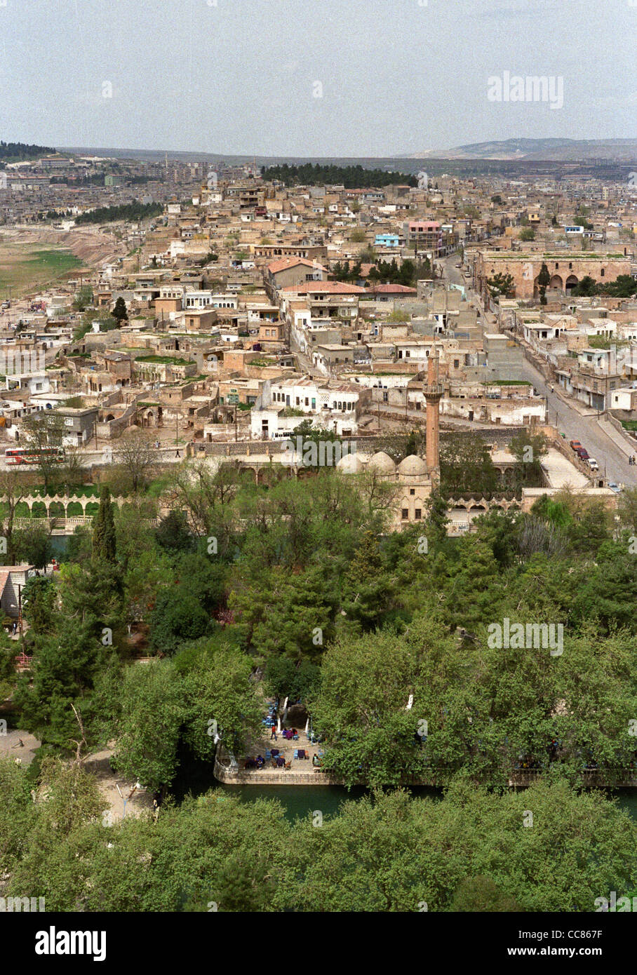 View of the city of Urfa from the hill overlooking the sacred pools and ...