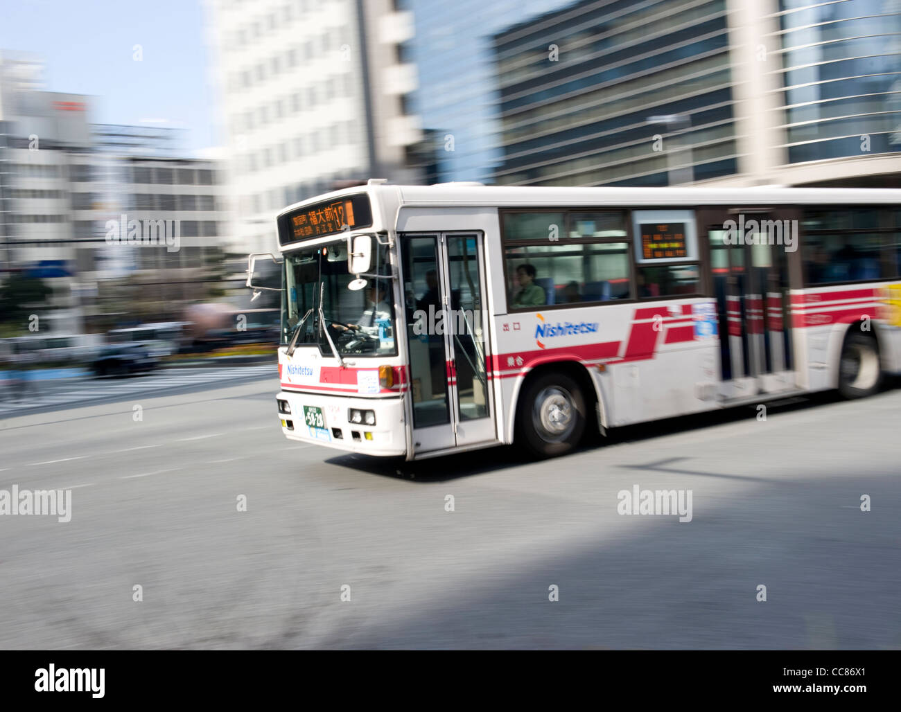 Moving bus on a road in Fukuoka, Kyushu, Japan, Asia Stock Photo - Alamy