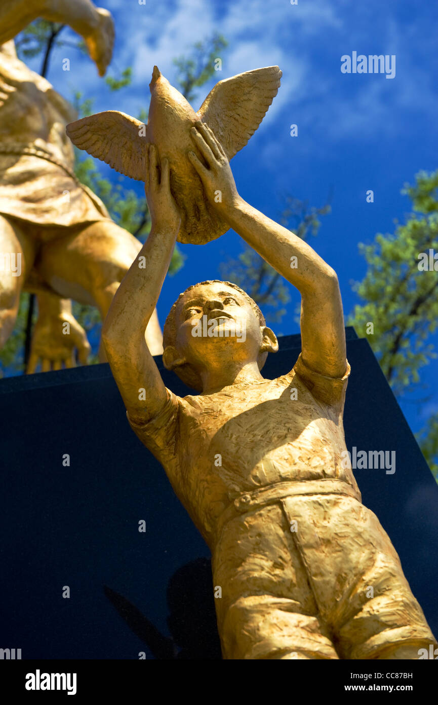 A statue outside the Atomic Bomb Museum commemorates the atomic bombing ...