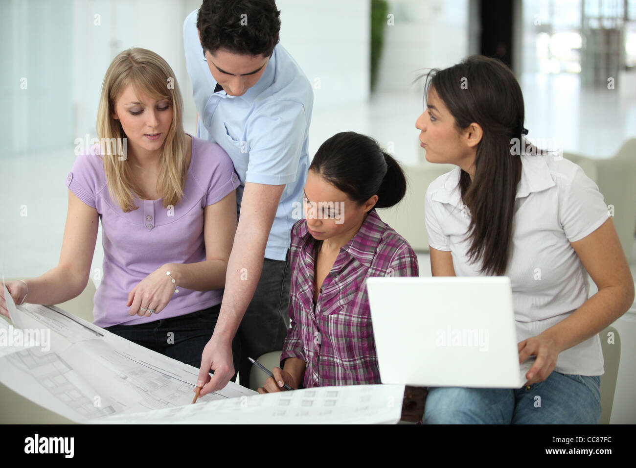 Group of architects working Stock Photo - Alamy