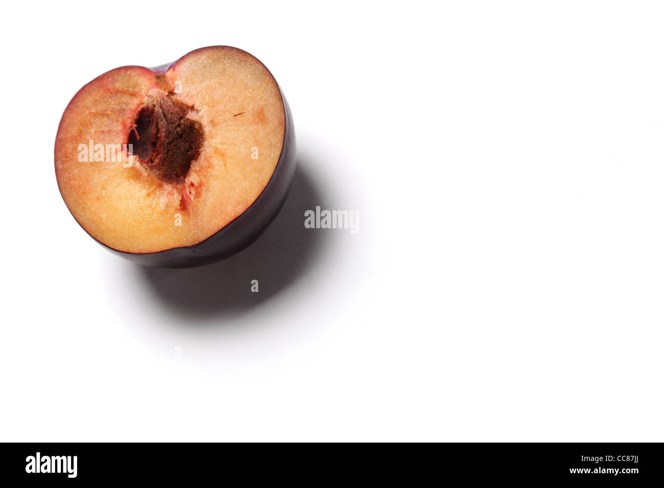 Plum cut out half hi-res stock photography and images - Alamy