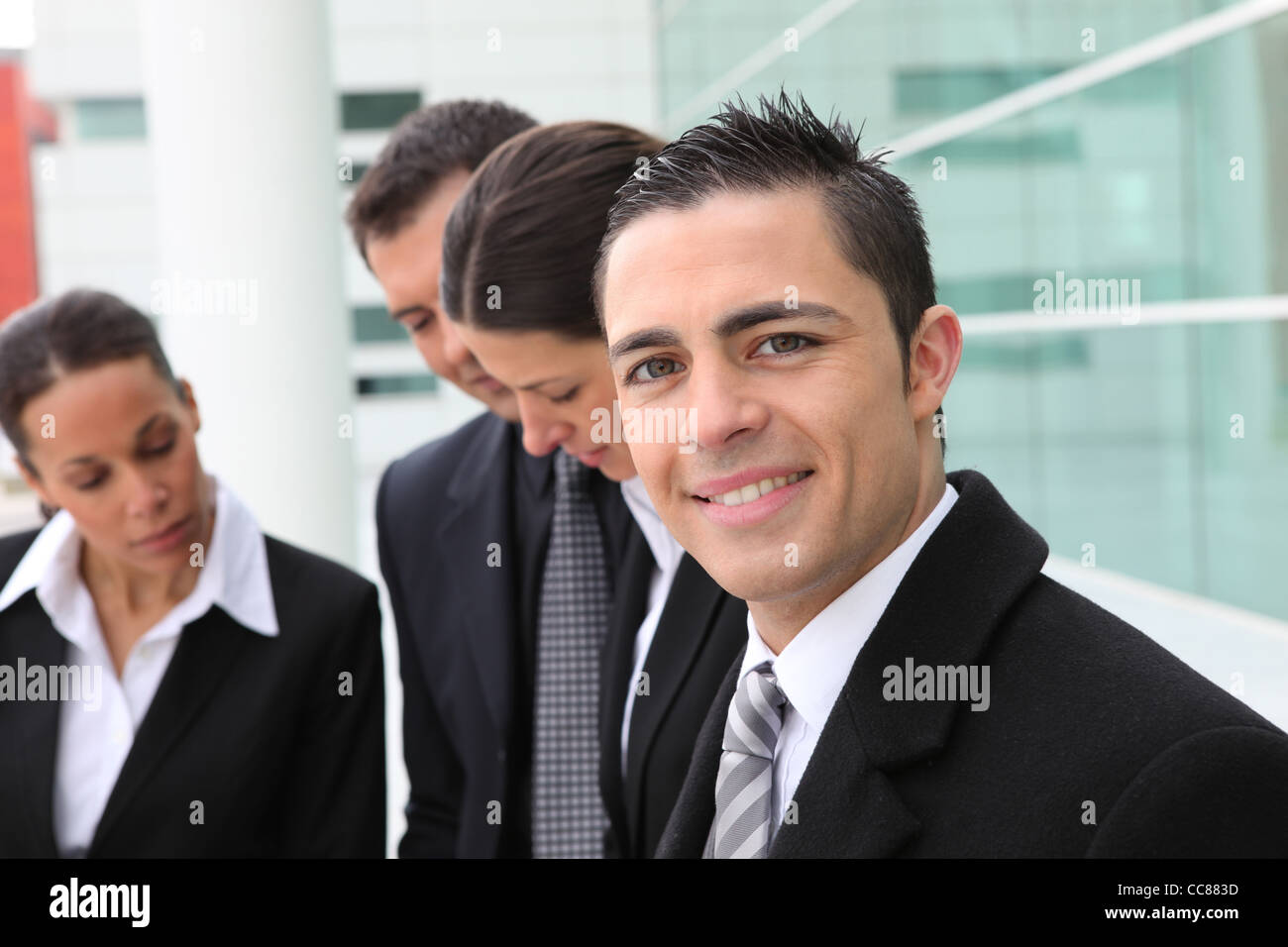 Colleagues working together Stock Photo - Alamy