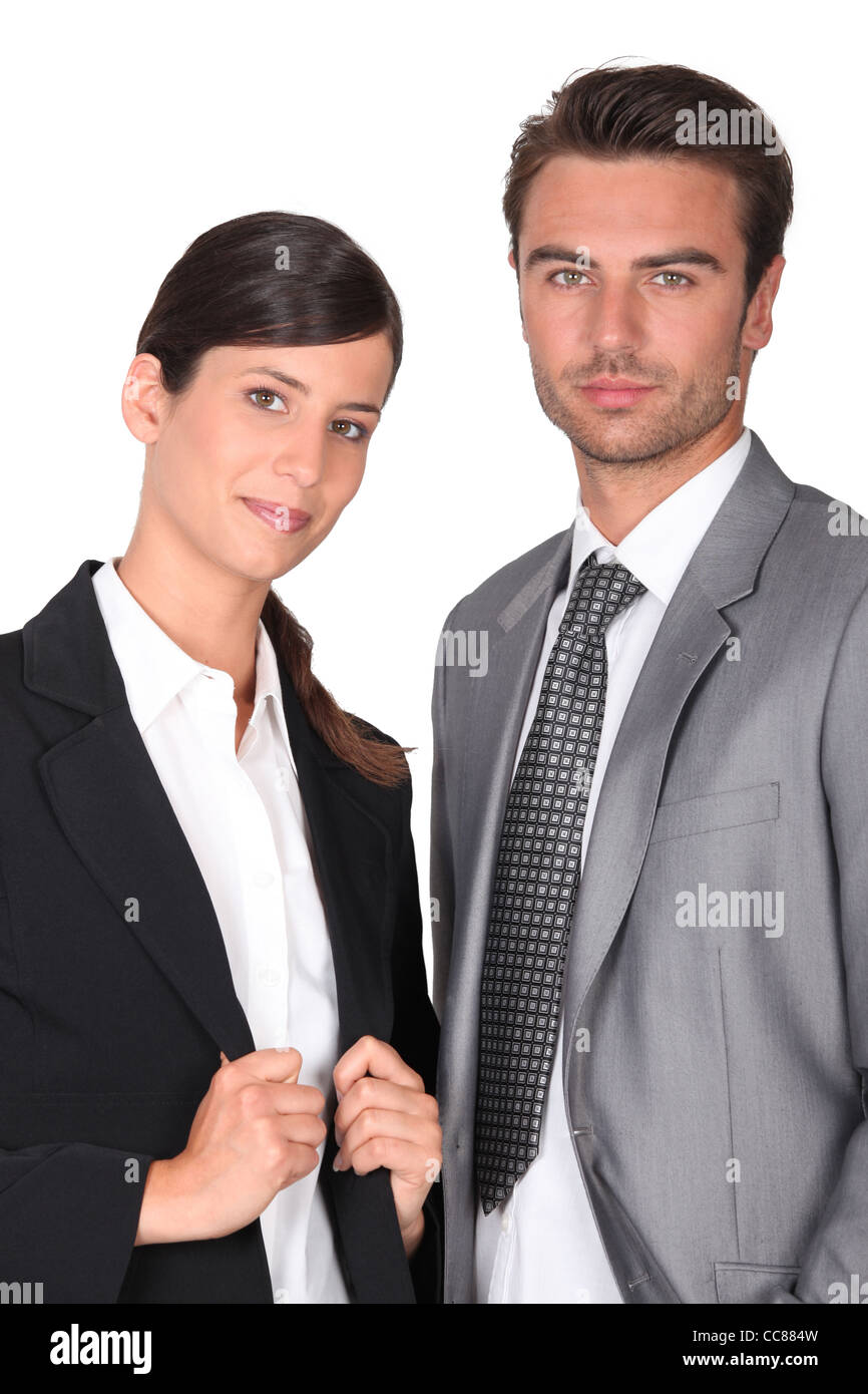 Dynamic business couple Stock Photo - Alamy