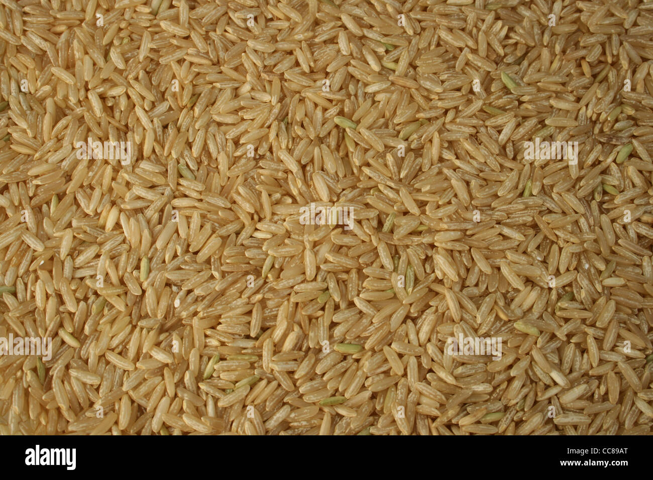 Background of healthy dry brown rice Stock Photo - Alamy