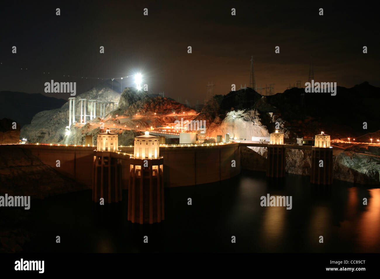 Hoover Dam at night from the upstream side with bridge construction ...