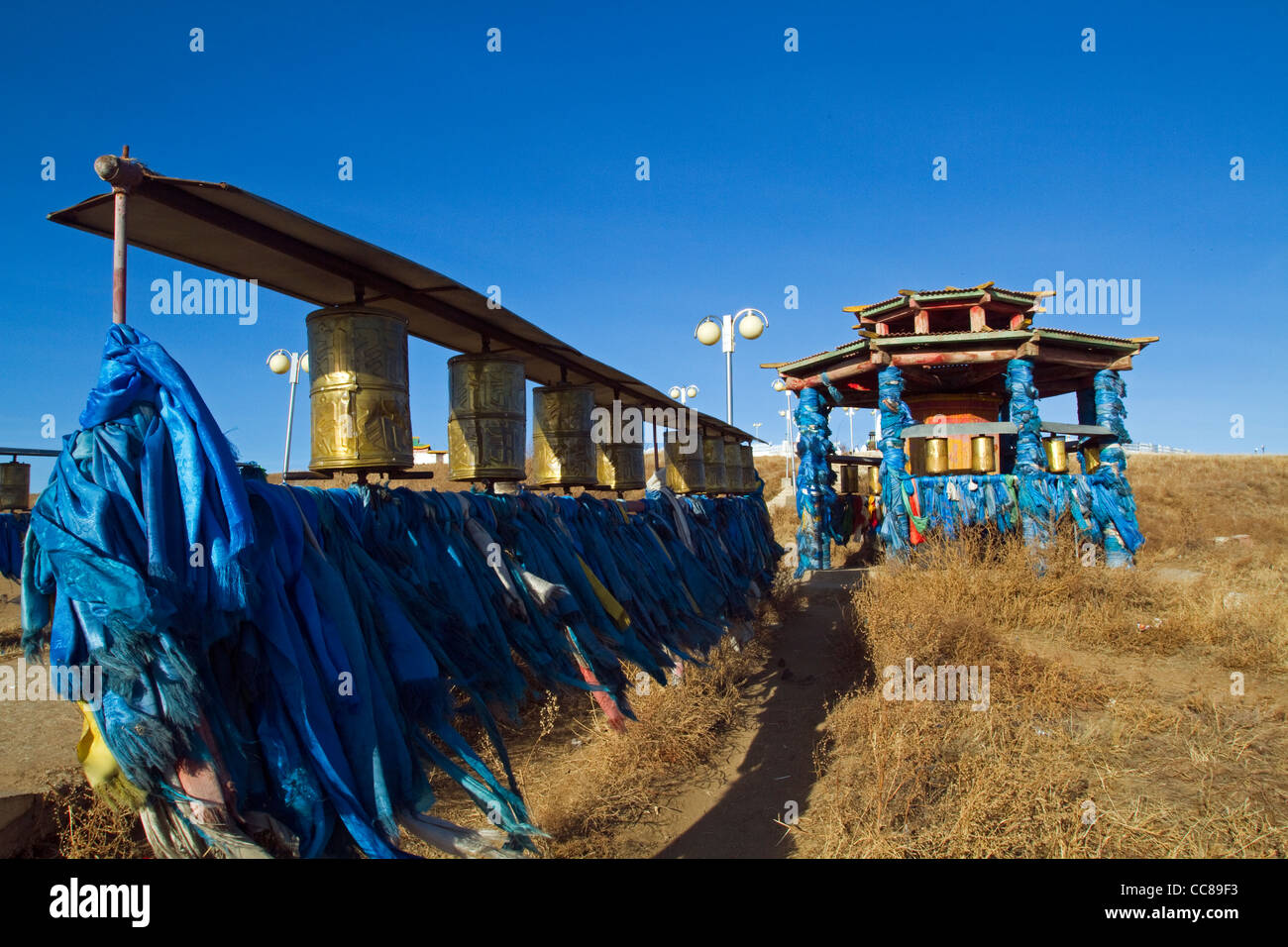 Flags and praying wheels Darkhan Monastery Mongolia Stock Photo - Alamy