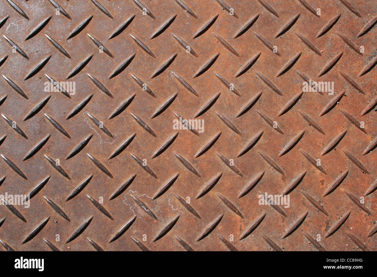 rusted textured steel panel with raised diamond pattern Stock Photo - Alamy