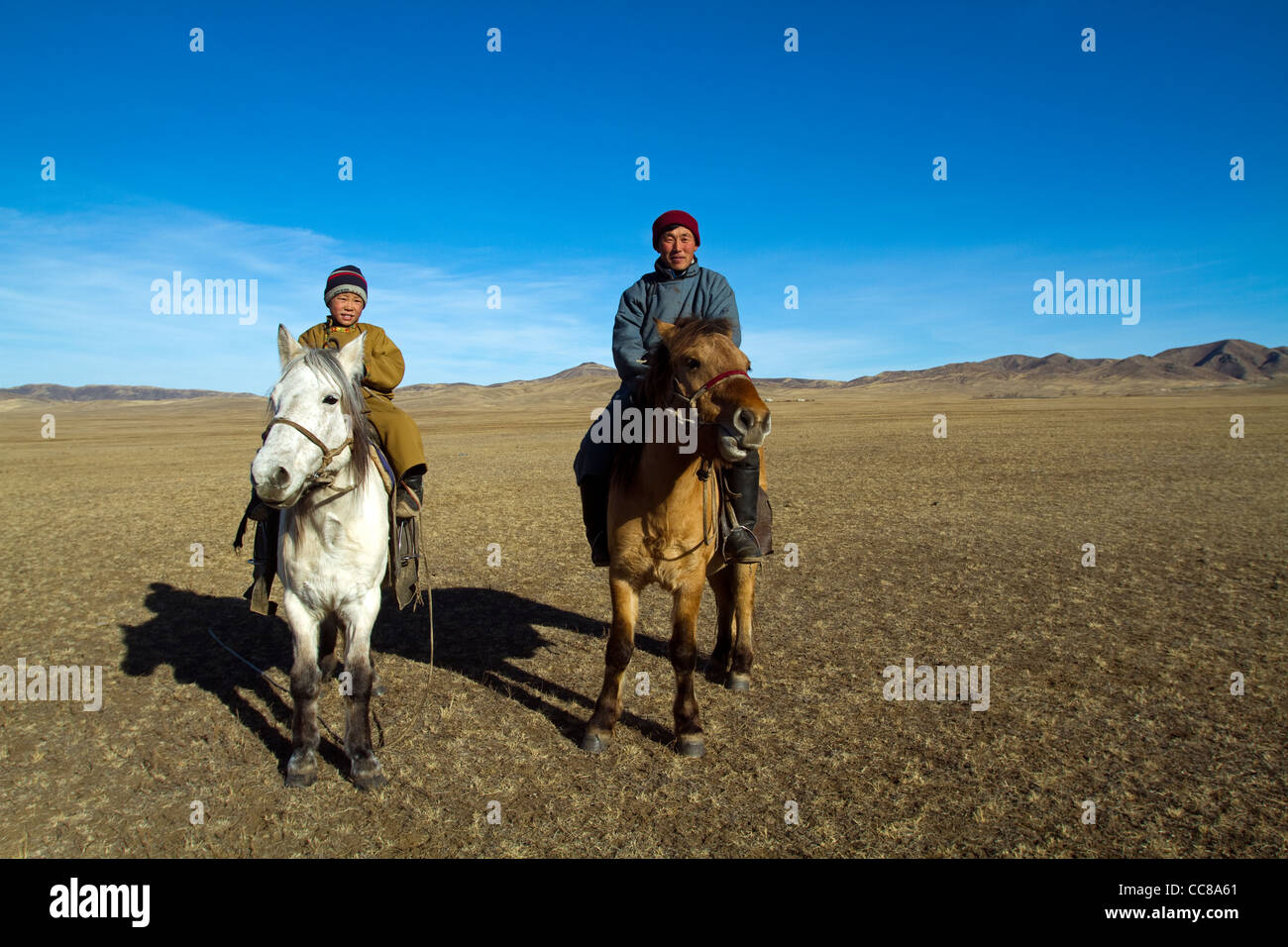 Mongolian herders in Gobi steppe Mongolia Stock Photo - Alamy