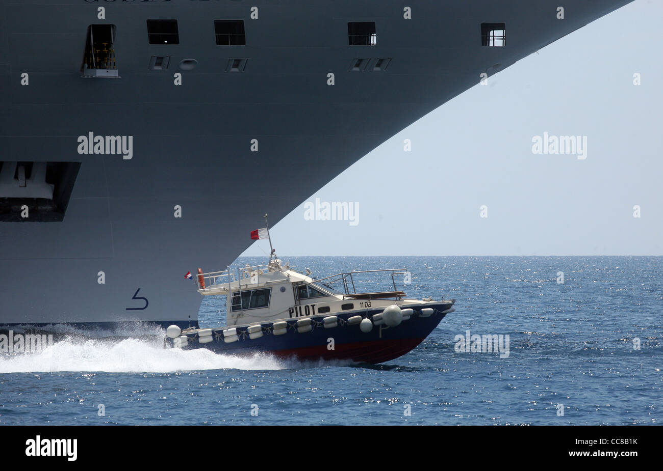 Big ship small ship hi-res stock photography and images - Alamy