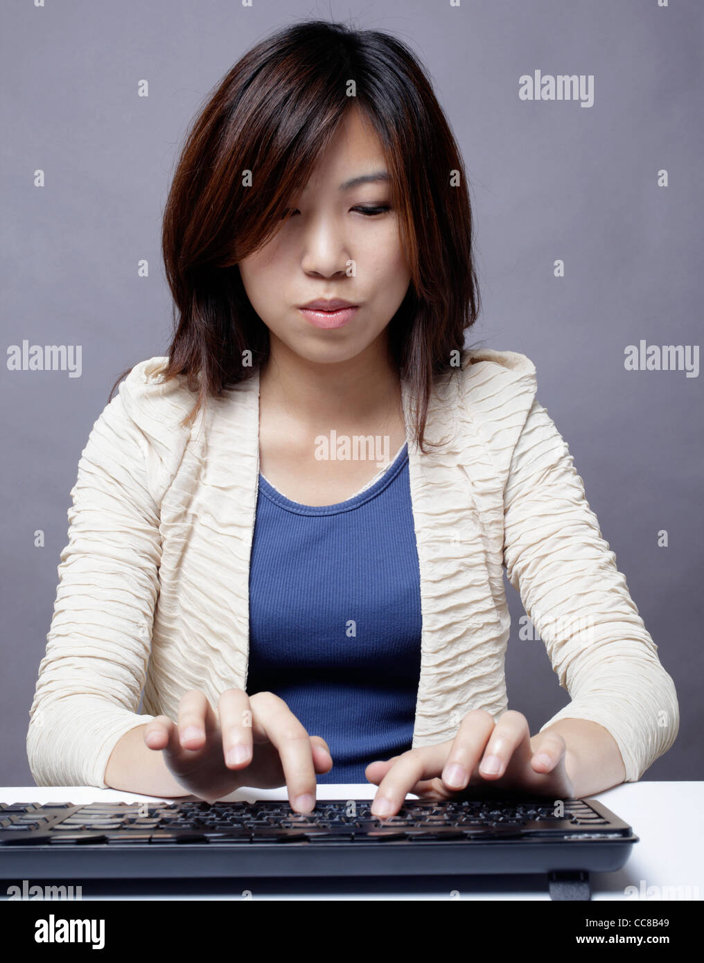 Office lady uses notebook computer Stock Photo - Alamy