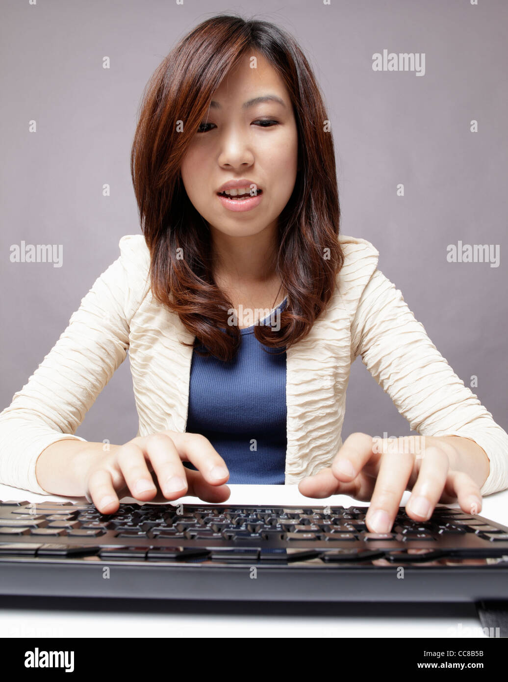 Office lady uses notebook computer Stock Photo - Alamy