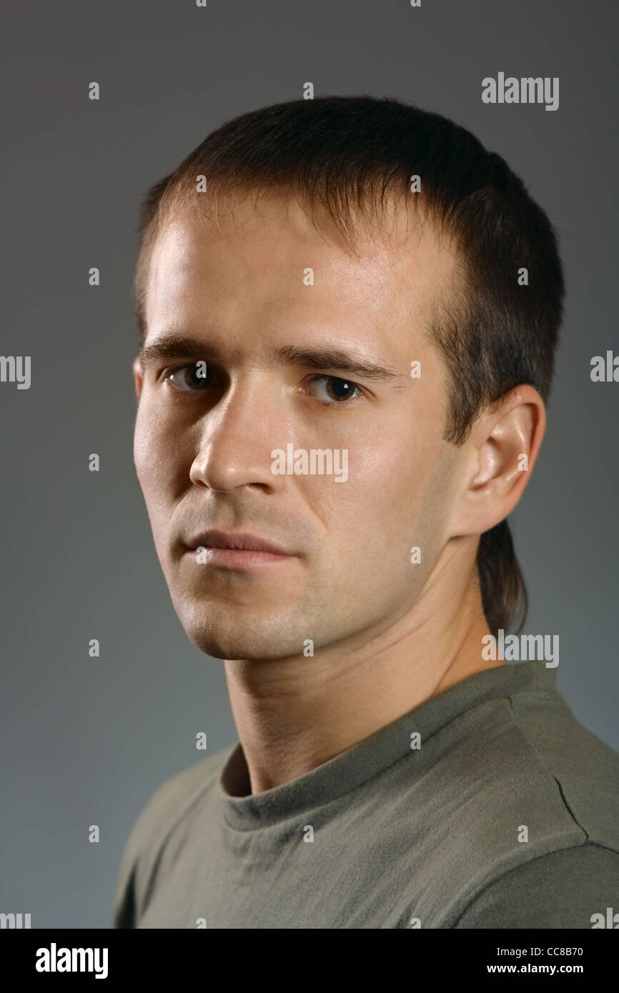 Portrait of a real man in the studio Stock Photo - Alamy