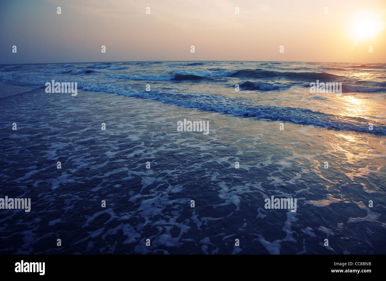 Horizontal photo of the sea during sunset. Natural darkness and colors ...