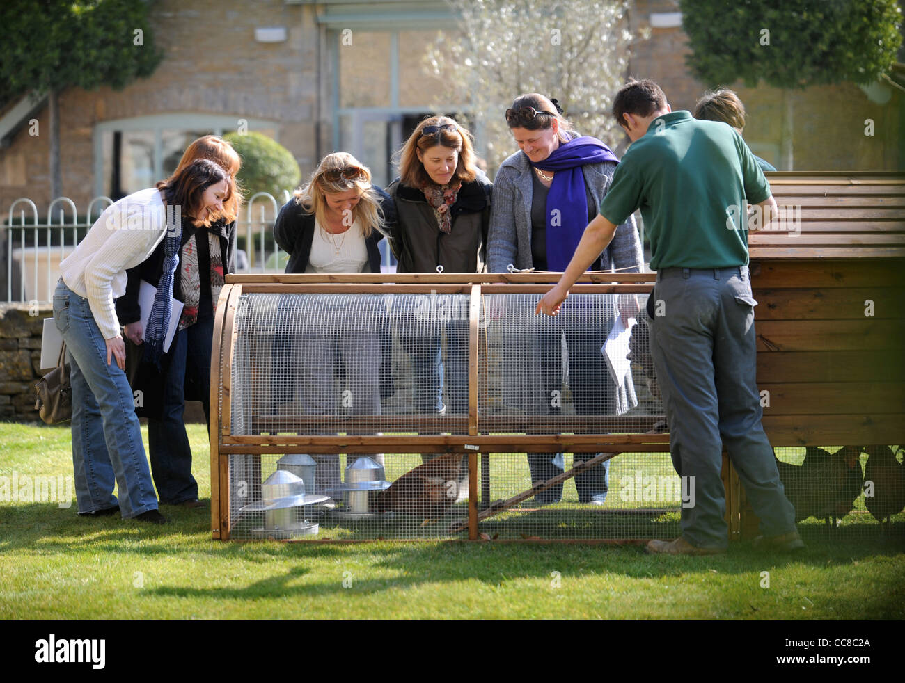 A poultryman gives a presentation on keeping chickens during a ...