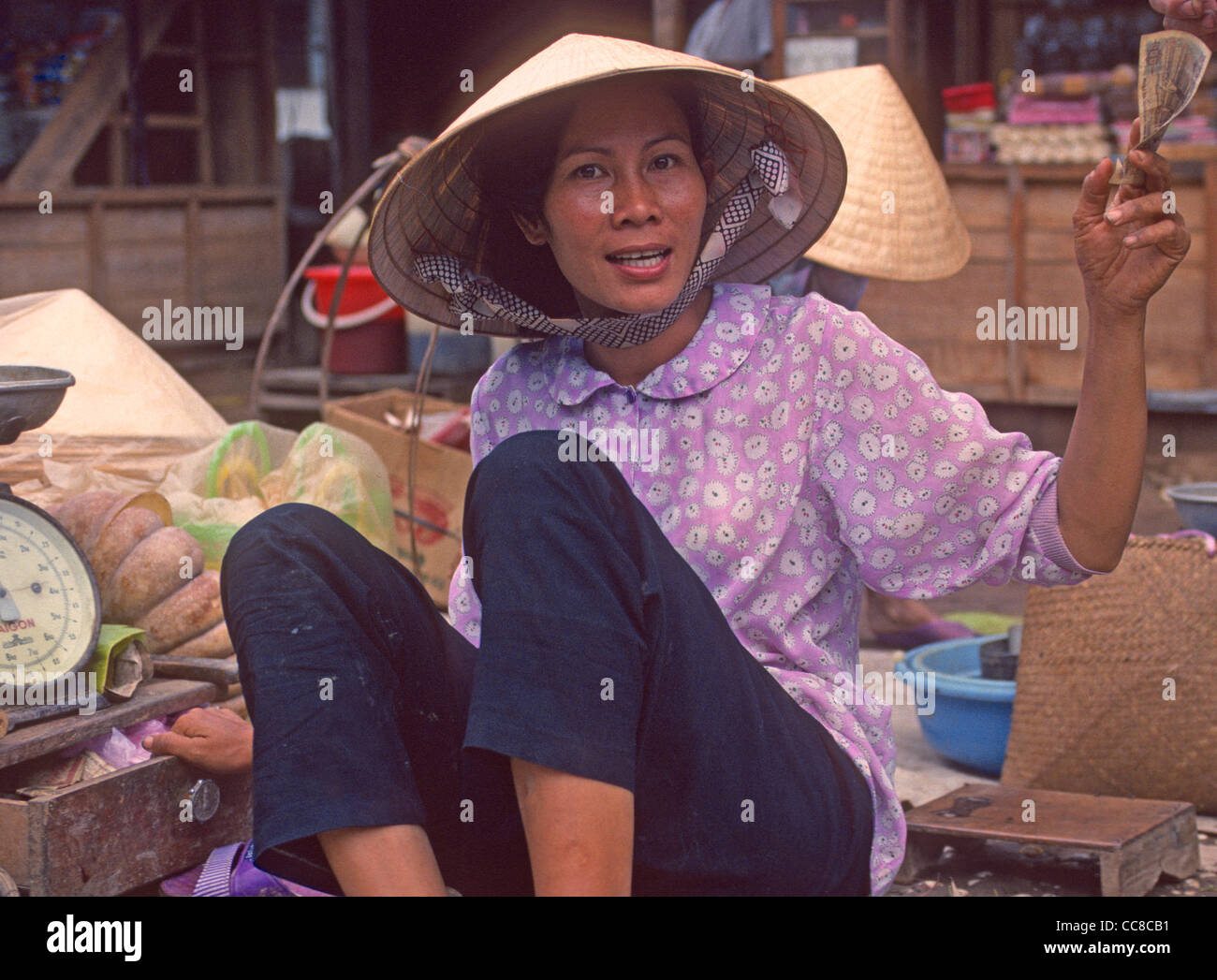 Woman in market Mekong Delta Vietnam Stock Photo - Alamy