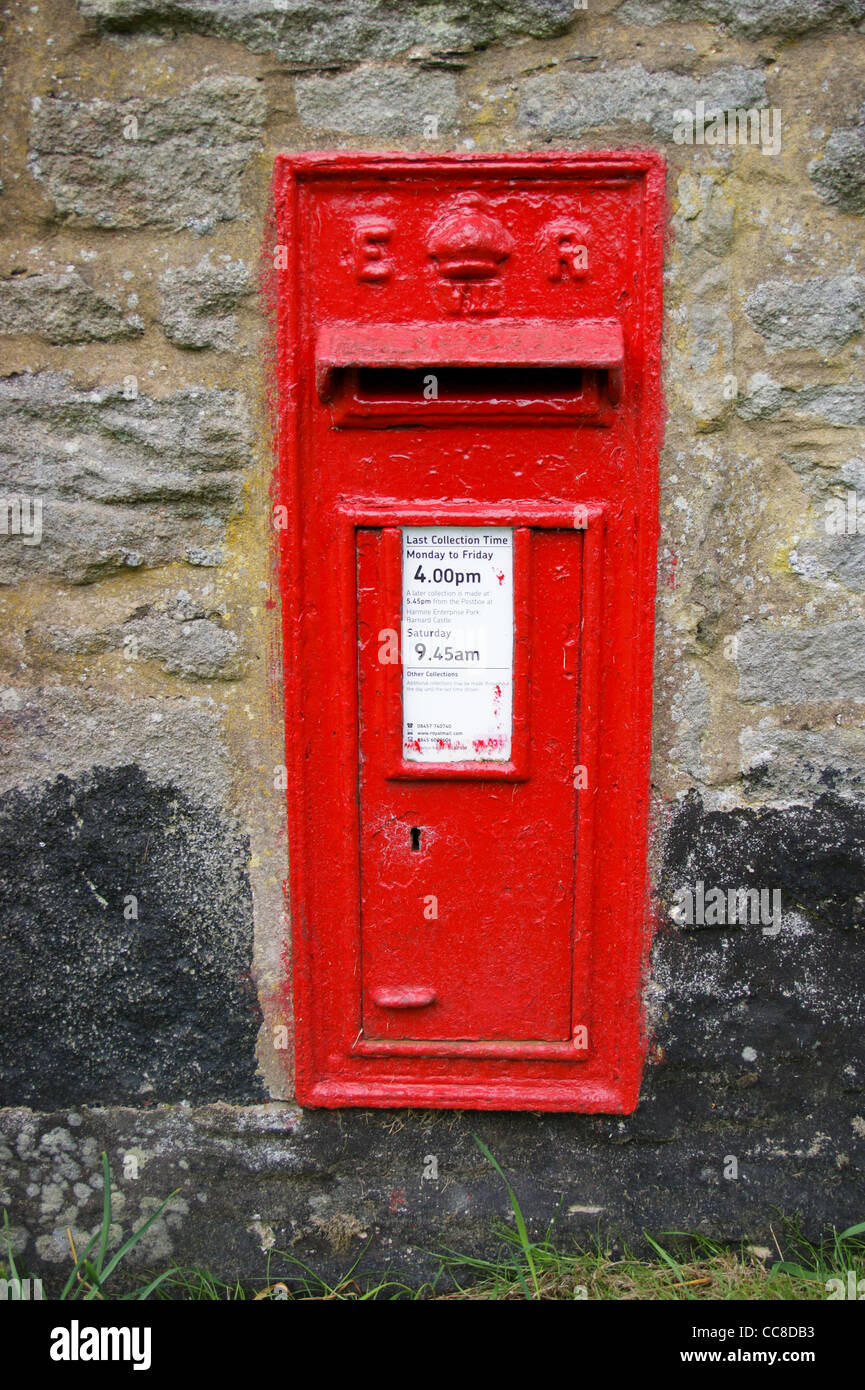 A red letterbox on a farm wall, Baldersdale, County Durham, England ...