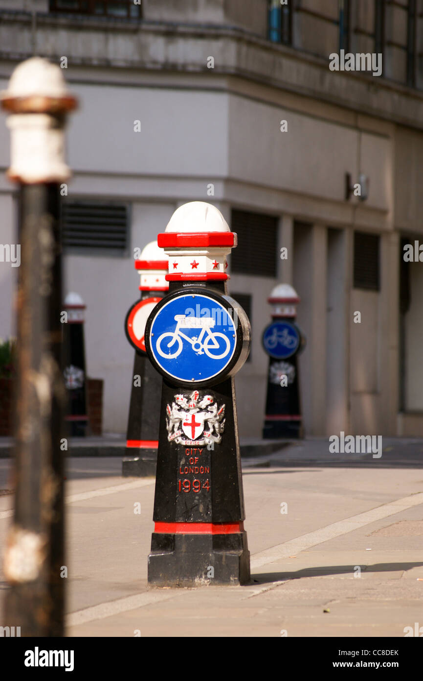 Cycle path signs with the City coat of arms in the City of London ...