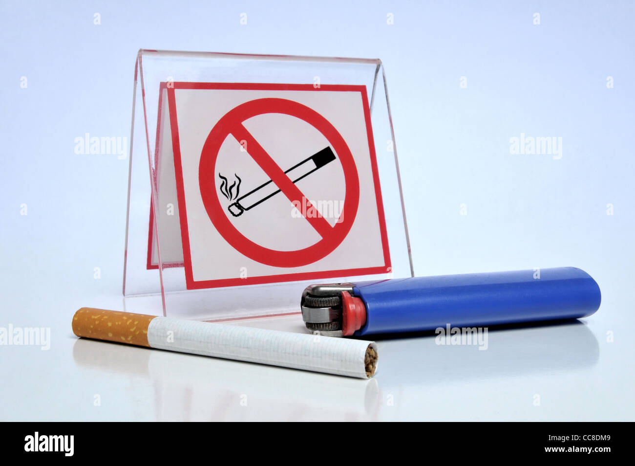 Smoking prohibited - Blue lighter, cigarette and no smoking sign on ...