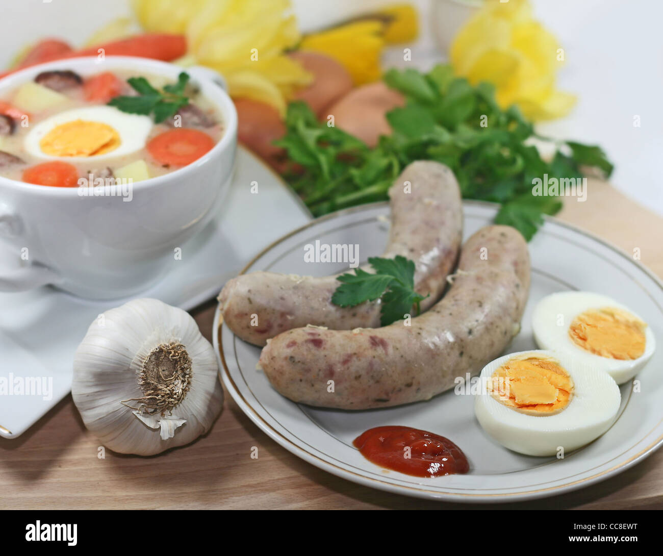 Traditional polish white borscht with eggs and sausage in white ...