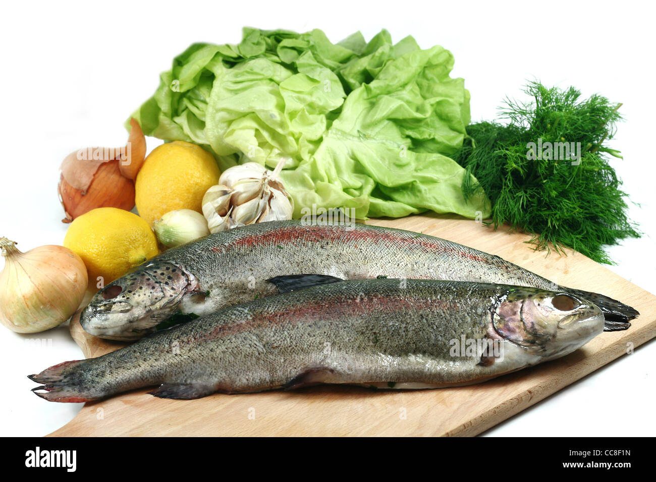 Fresh fish close up with vegetables Stock Photo - Alamy