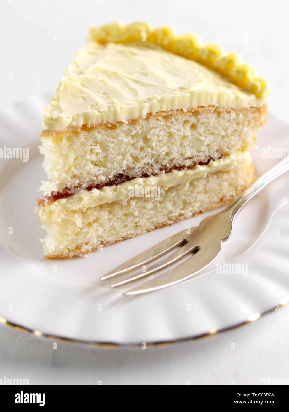 A slice of Victoria sponge cake Stock Photo - Alamy