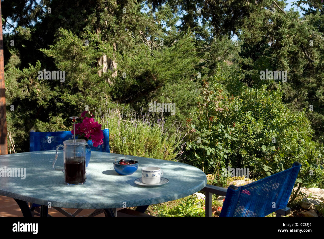 Outdoor table with coffee, Crete, Greece Stock Photo - Alamy