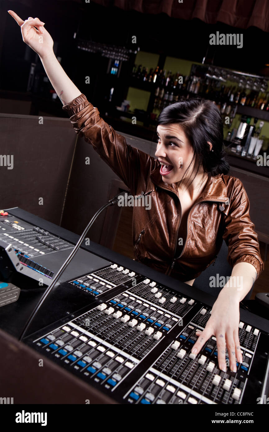 Soundboard technician doing a sound check Stock Photo - Alamy