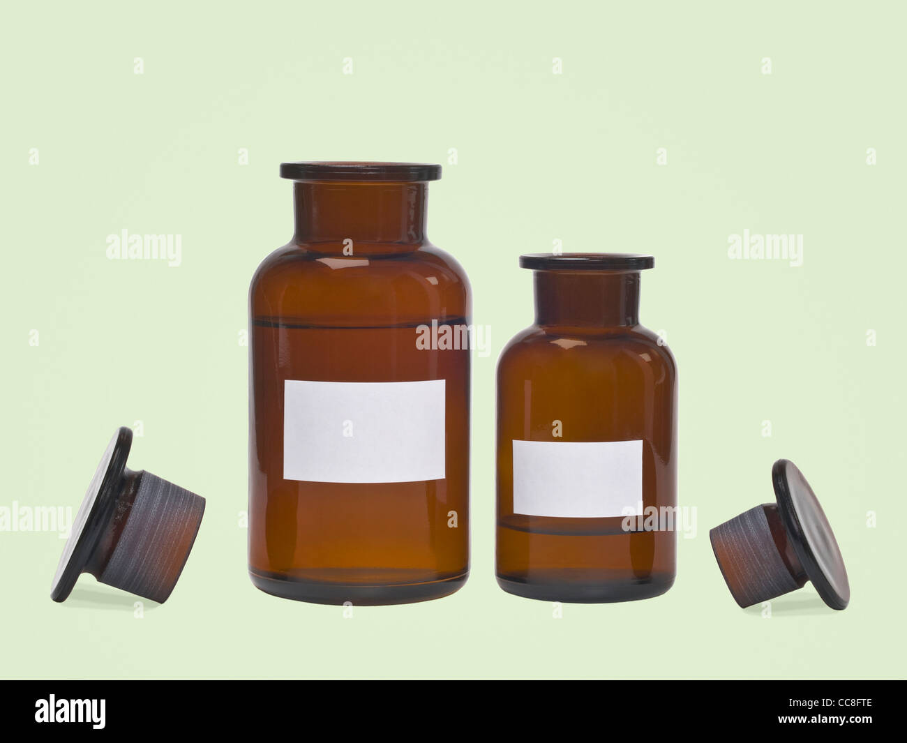 Detail photo of two opened pharmacists bottles Stock Photo - Alamy