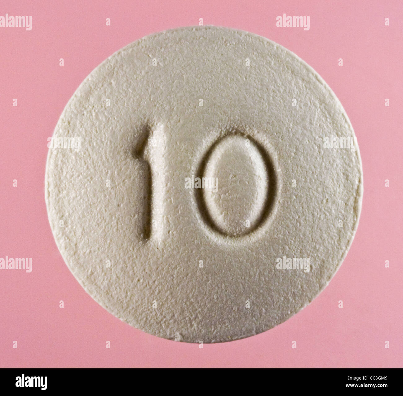 macro detail of large pill with number 10 inscribed on it Stock Photo ...