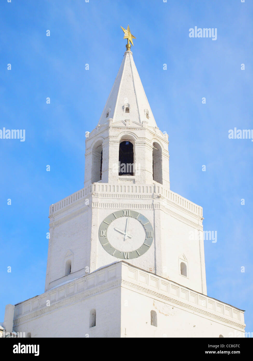 White clock tower against the blue sky Stock Photo - Alamy