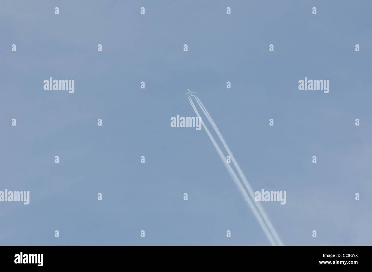 jet airplane and vapor trail Stock Photo - Alamy