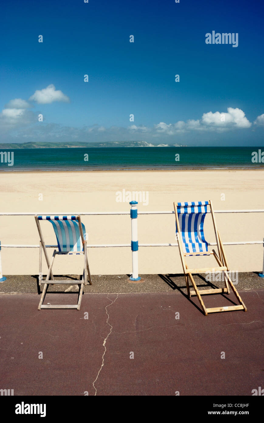 Empty wind blown deckchairs, Weymouth, dorset, England, UK Stock Photo ...