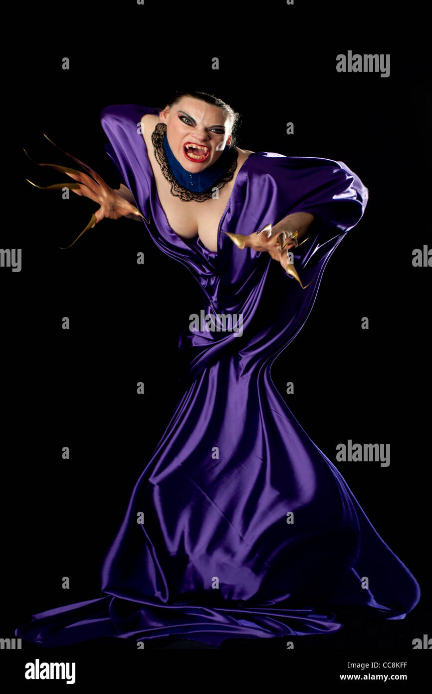 Scary distorted buxom female vampire Stock Photo - Alamy