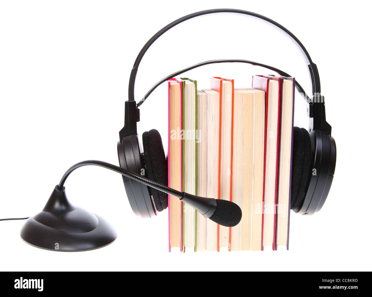 Books stack and headset with a microphone isolated on white Stock Photo ...