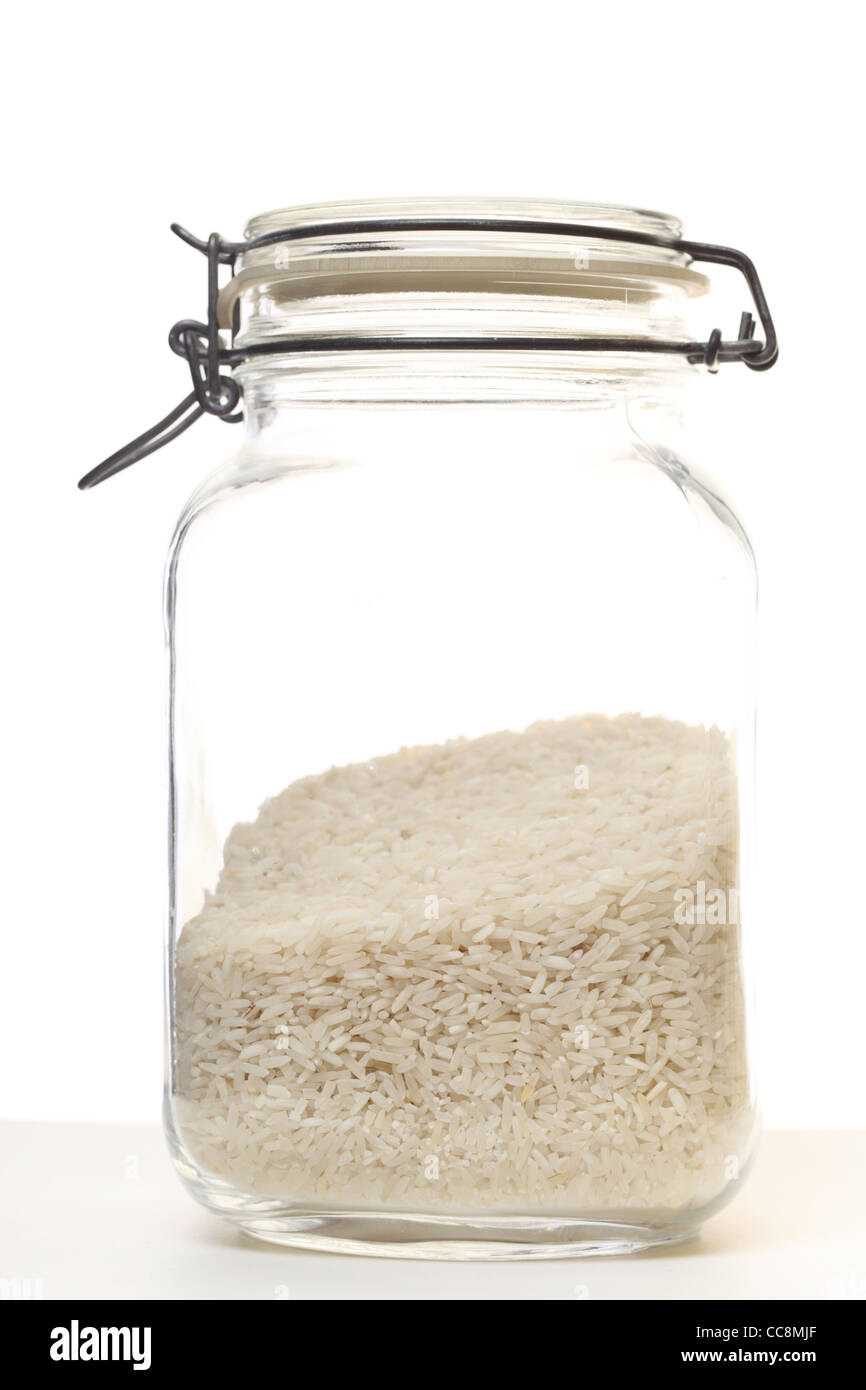 natural rice in jar on white background Stock Photo - Alamy