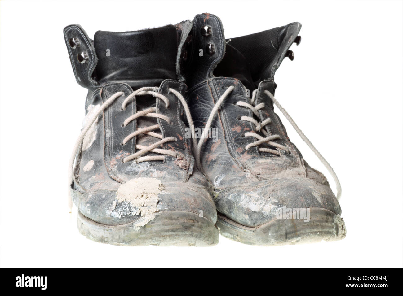Black Worn-out old work boots, isolated on white Stock Photo - Alamy