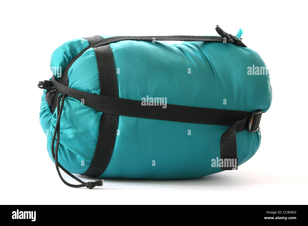 Packed sleeping-bag on white background Stock Photo - Alamy