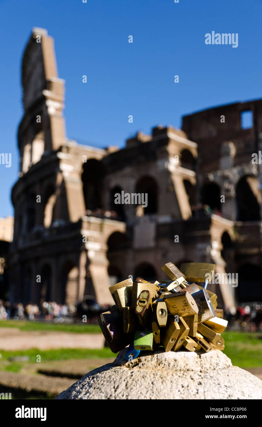 Love padlocks by the Colosseum or Coliseum Rome Italy Stock Photo - Alamy