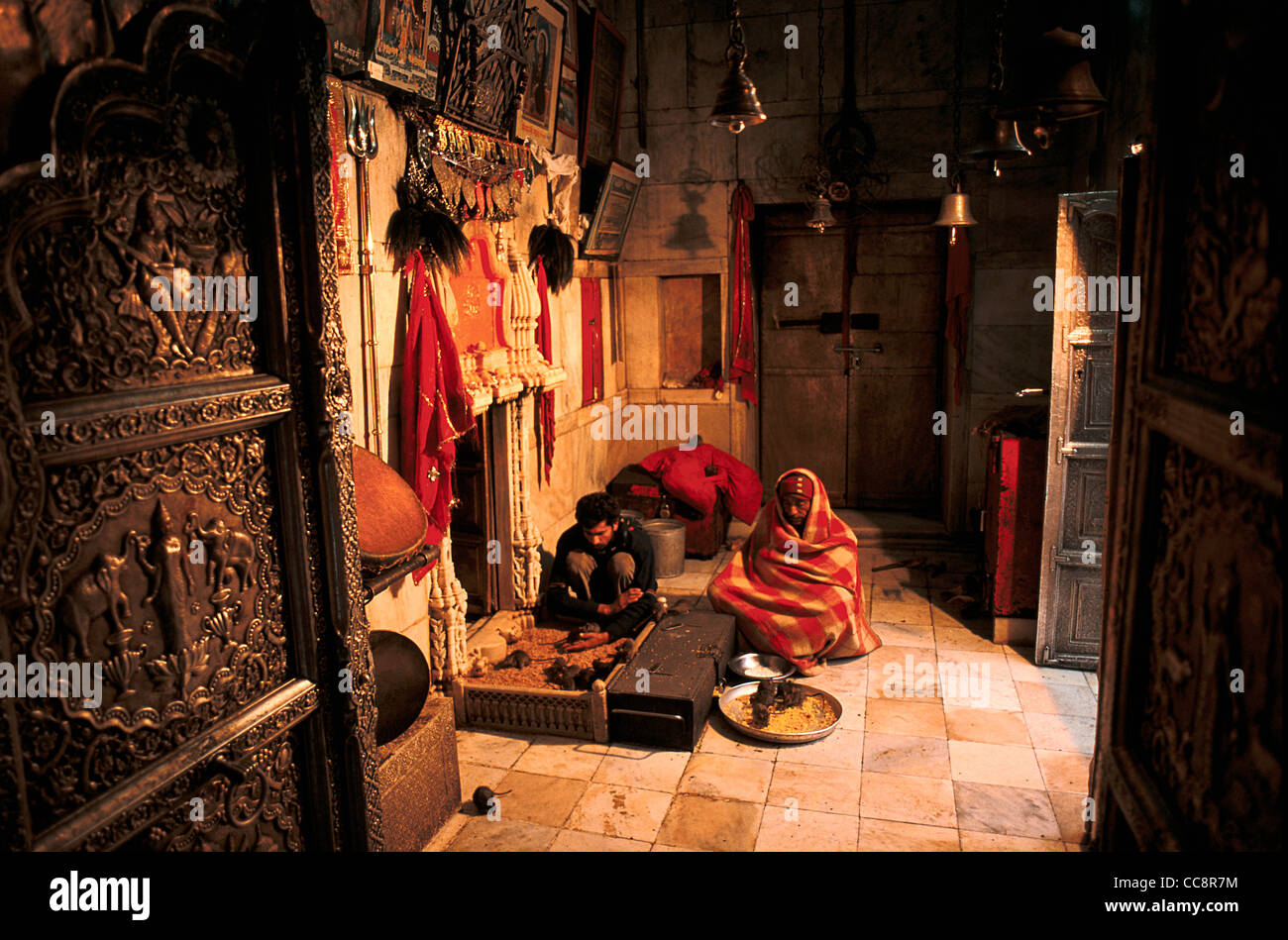 Devotees and rats inside an hindu temple dedicated to Karni Mata, a ...