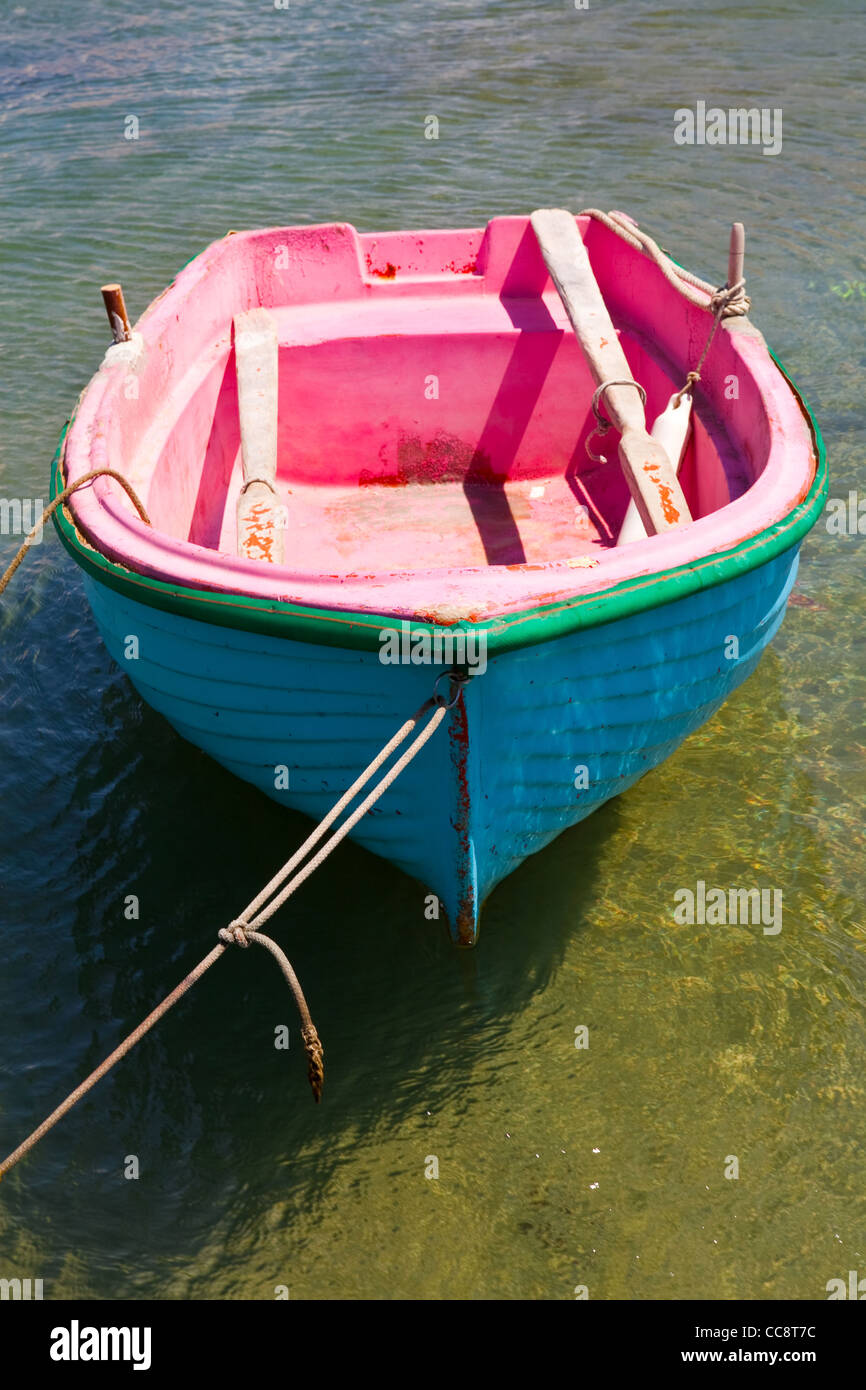 Pink and blue rowing boat in Mykonos, Greece Stock Photo - Alamy