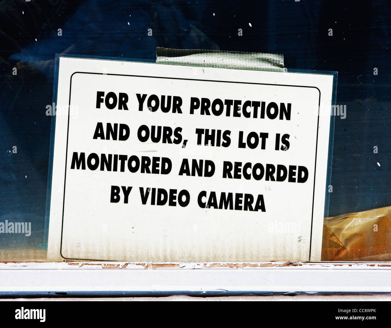 surveillance warning sign in window Stock Photo - Alamy