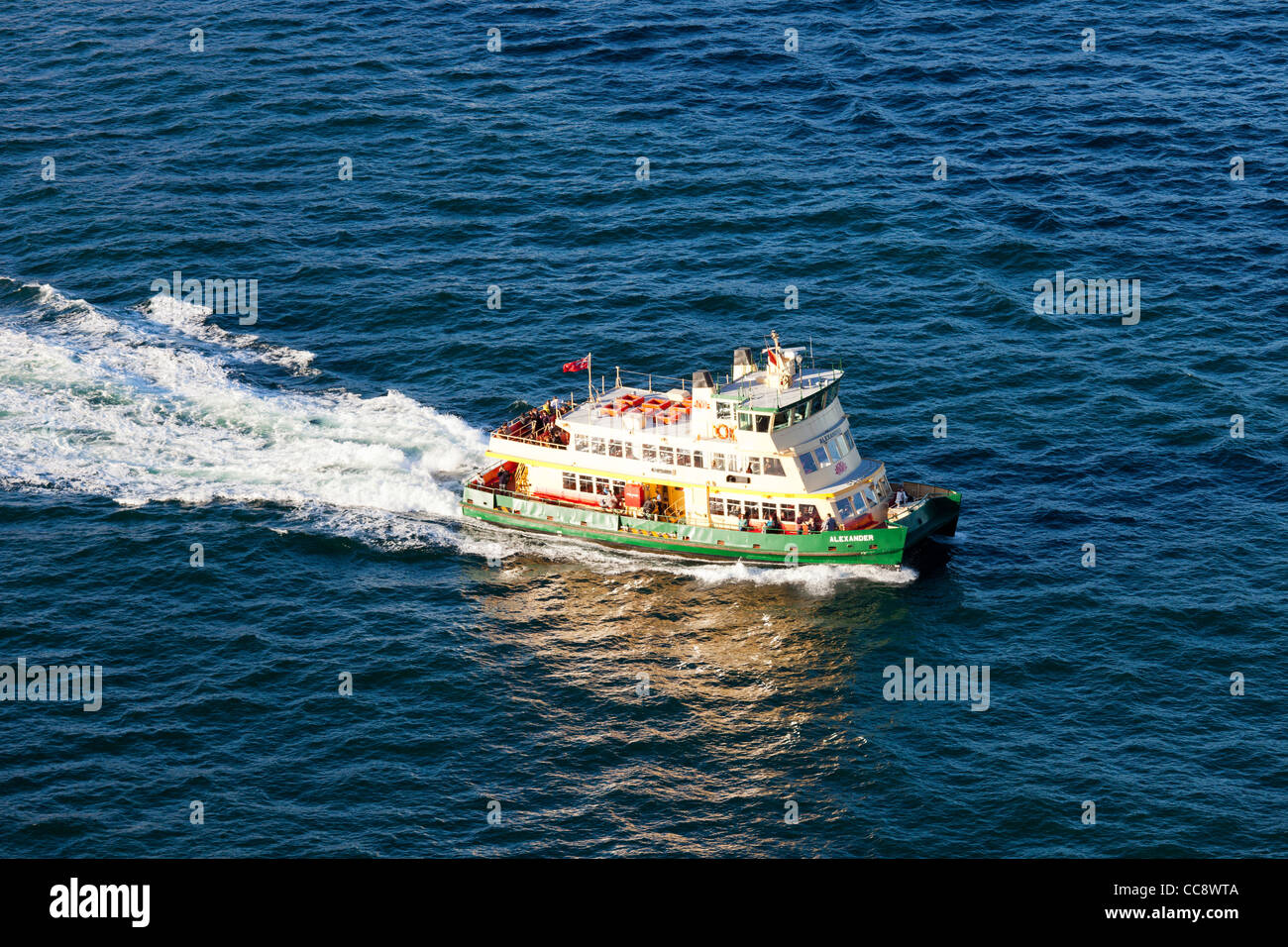 Green and Gold ferries in Sydney Harbour Stock Photo - Alamy