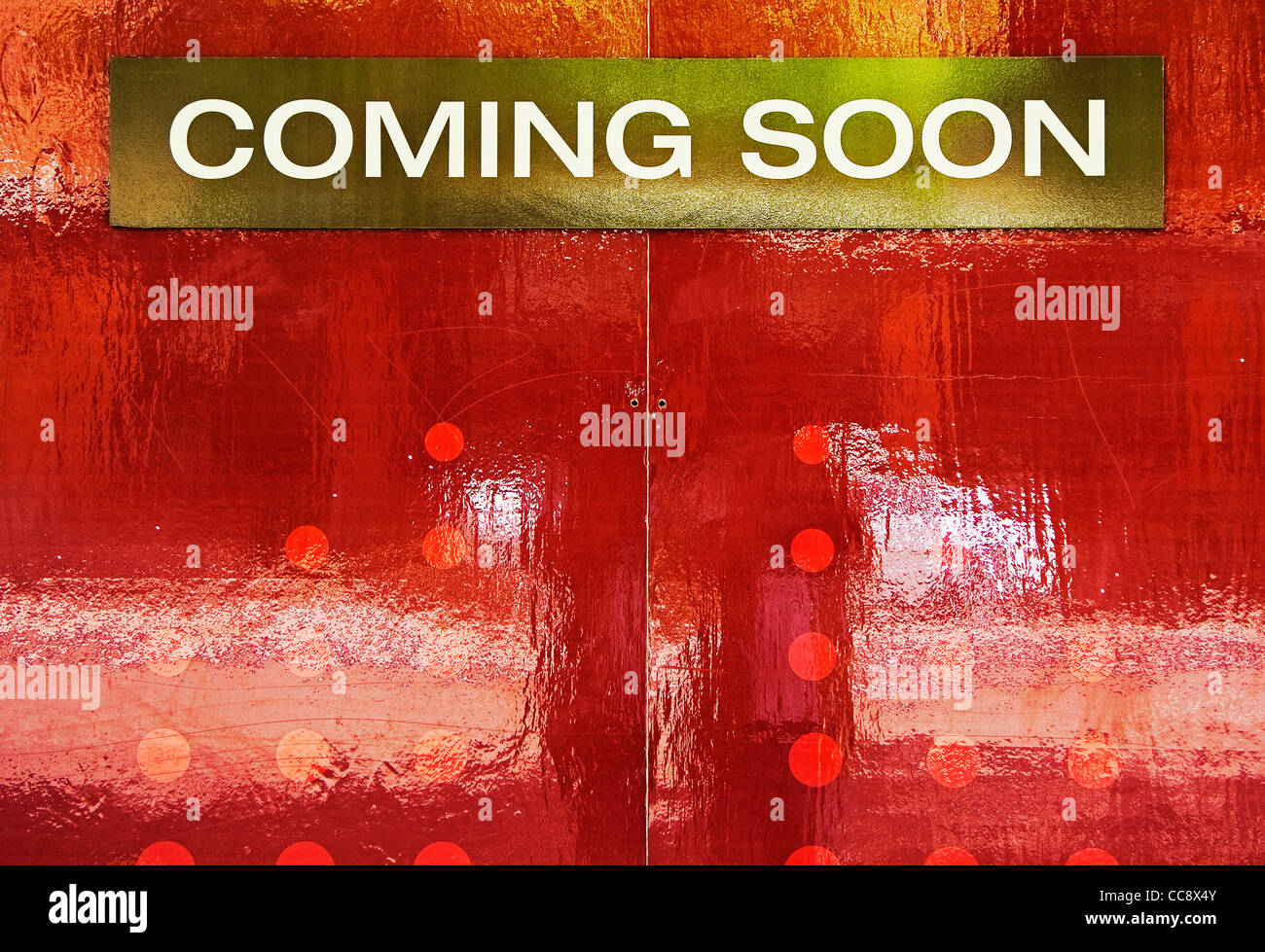 coming soon sign mounted on glossy wall Stock Photo - Alamy