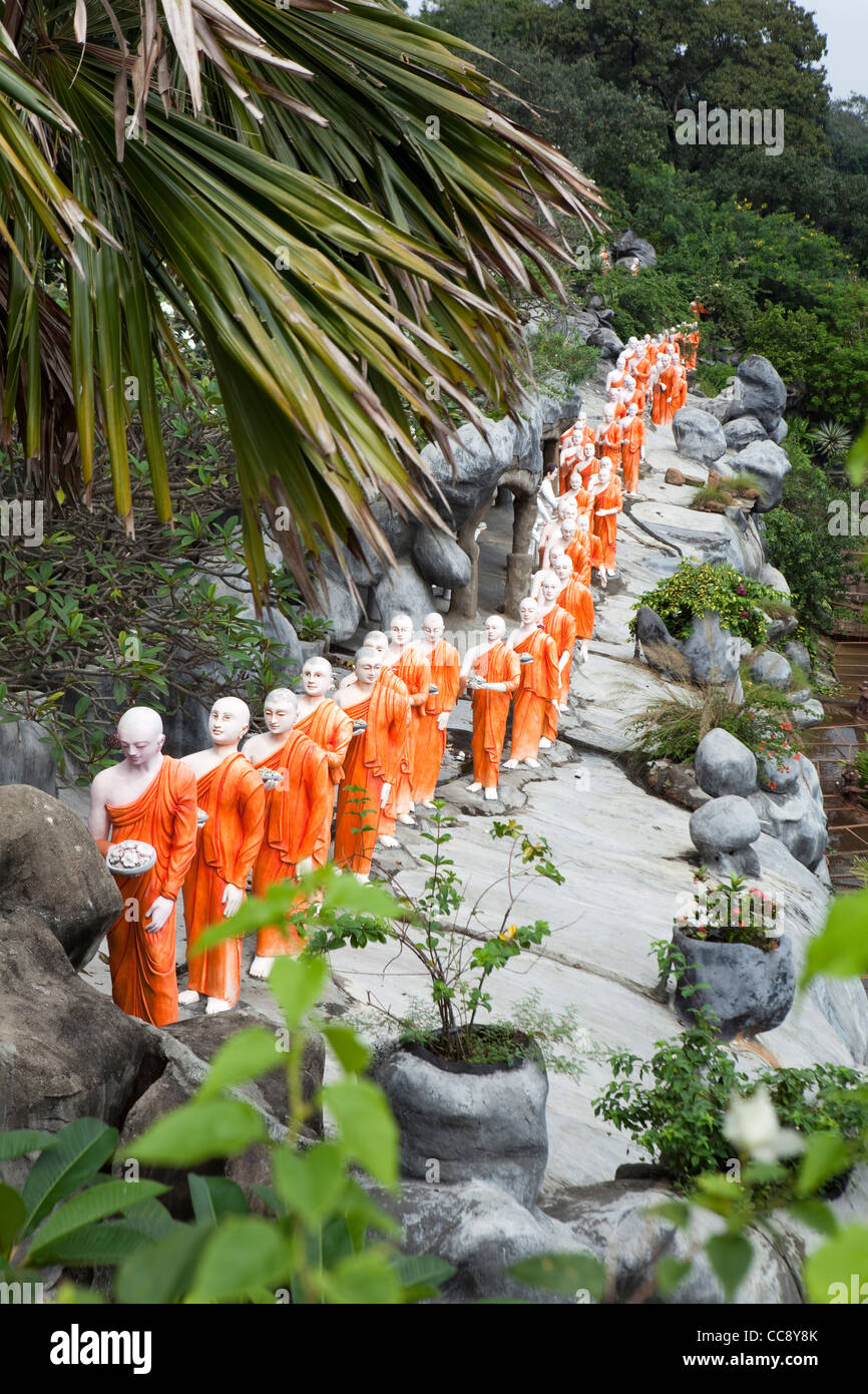 A view of a line of Buddha statues outside the Dambulla caves in Sri ...