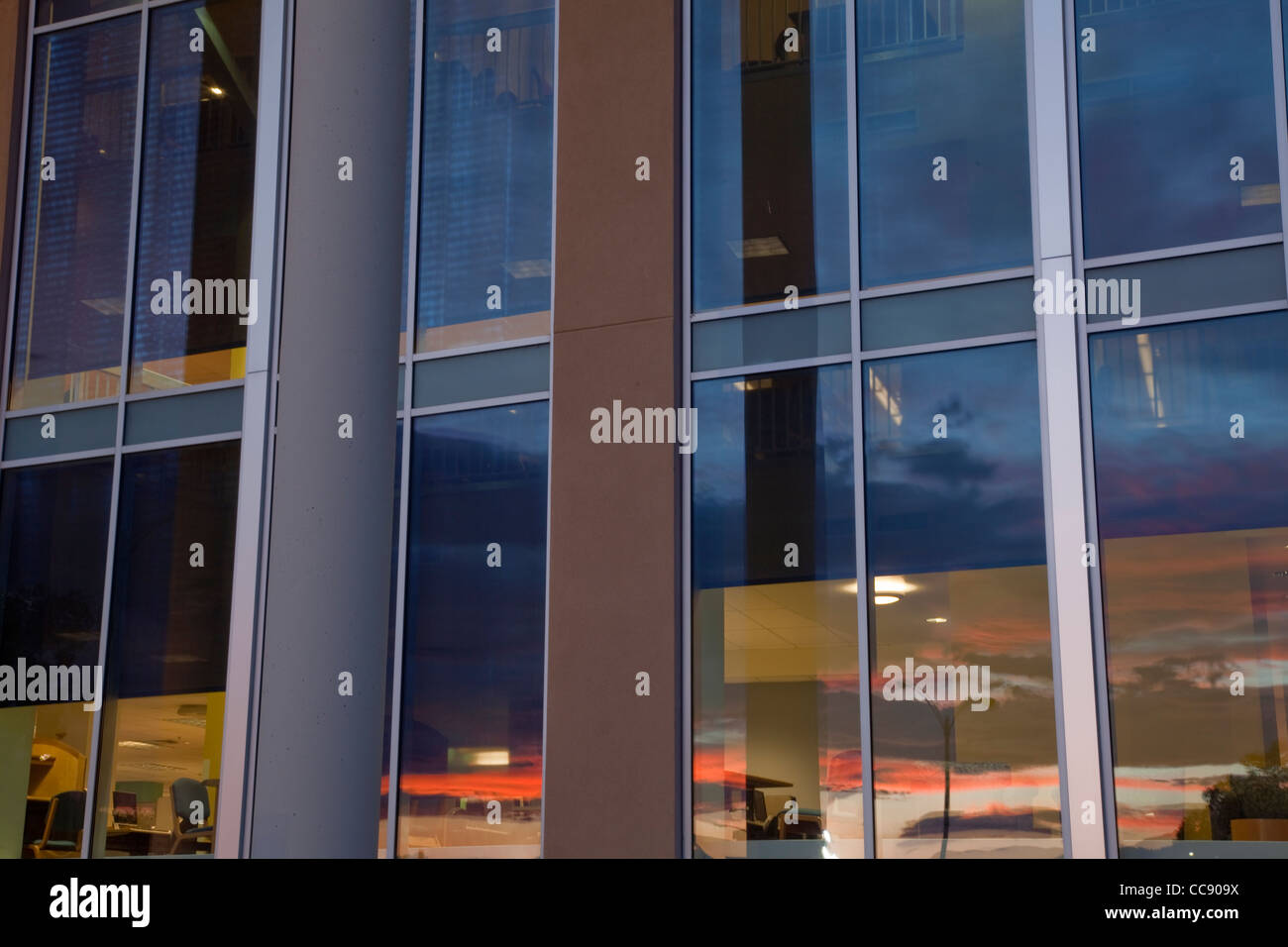 architecture abstract - large window of a library with sunset ...